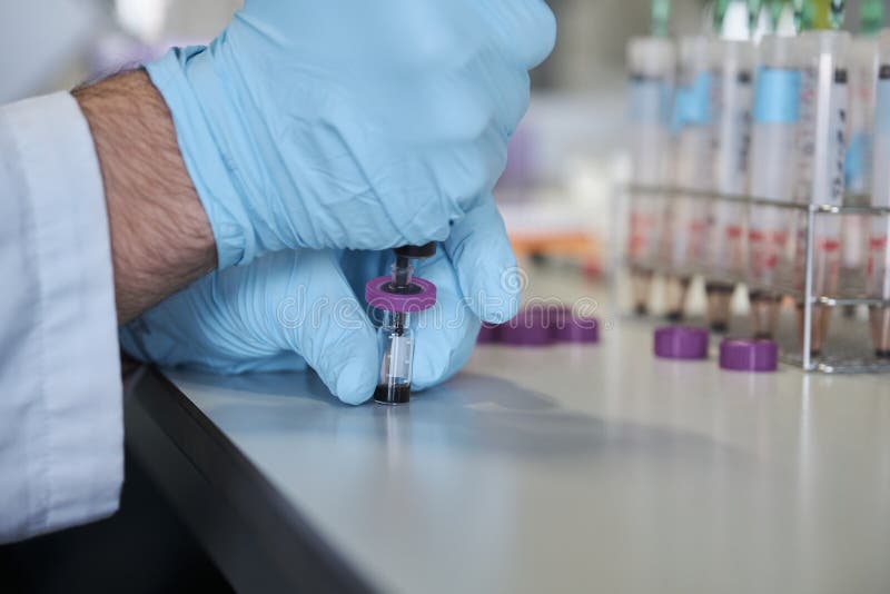 Scientist in White Lab Coat Filter Sample into HPLC Vial. Stock Image ...