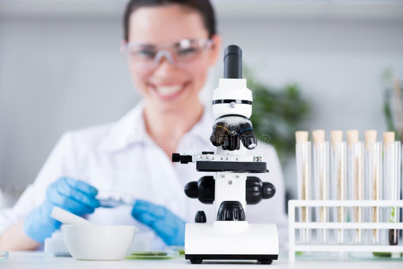 Scientist During Work With Microscope At Modern Biological Laboratory ...