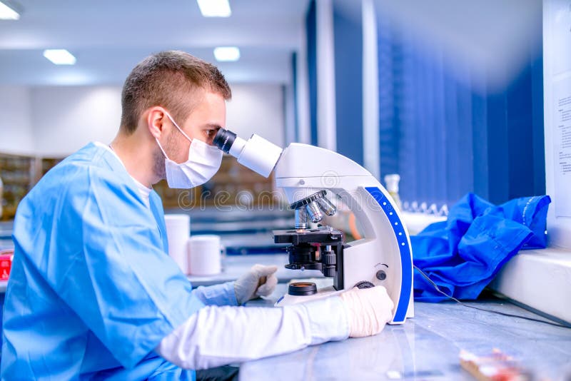 Scientist Working in Chemistry Laboratory, Examining Samples Stock ...