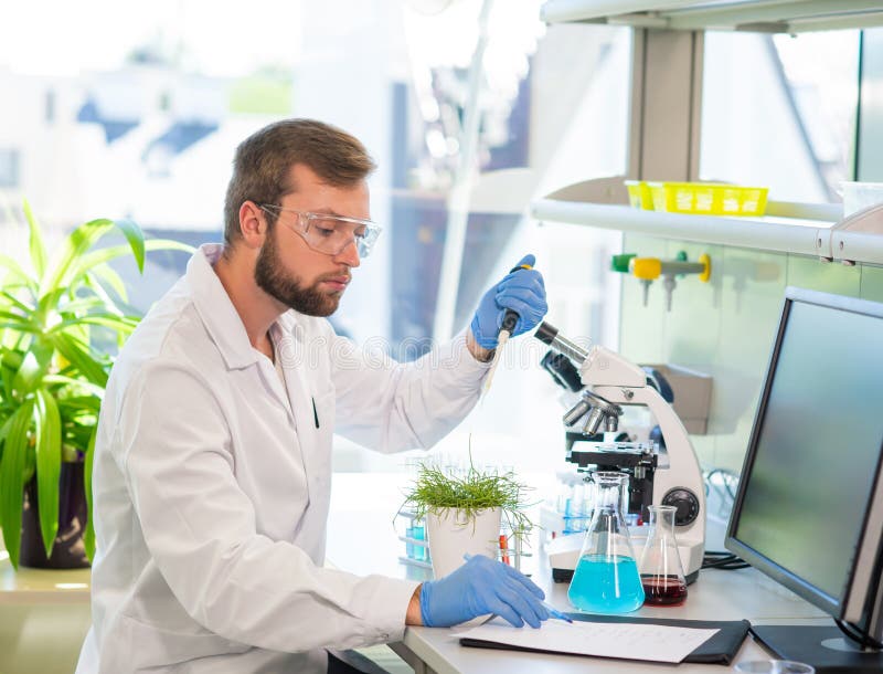 Scientist Working in Lab. Doctor Making Microbiology Research Stock ...
