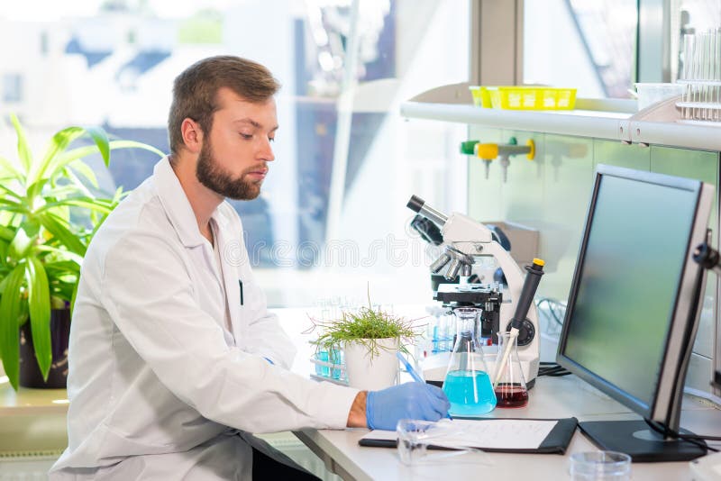 Scientist Working in Lab. Doctor Making Microbiology Research Stock ...