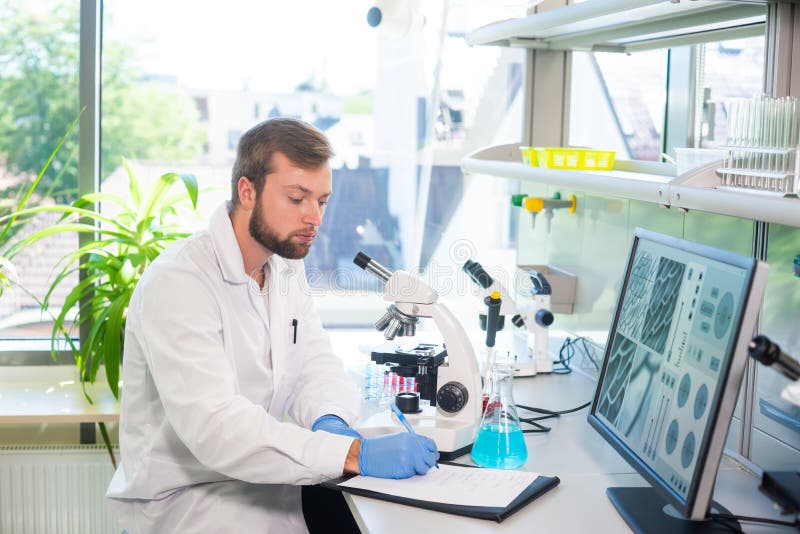 Scientist Working in Lab. Doctor Making Microbiology Research Stock ...