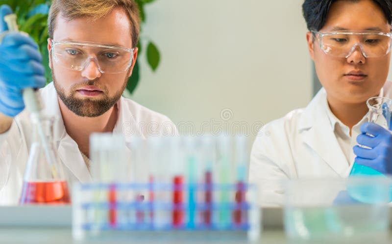 Scientist Working in Lab. Doctors Making Medical Research Stock Photo ...