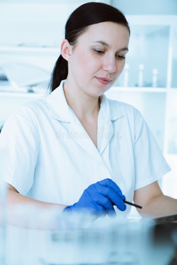 Scientist Working in the Lab Stock Photo - Image of liquid, clinic ...