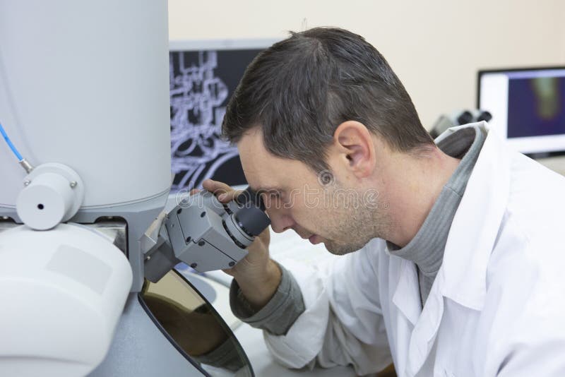 Scientist Working at the Laboratory. Screen Image of Molecule Made by ...