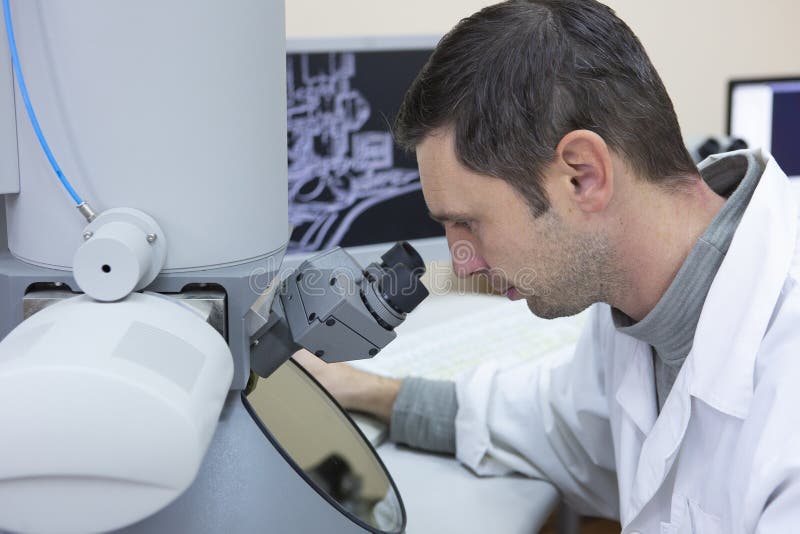 Scientist Working at the Laboratory. Screen Image of Molecule Made by ...