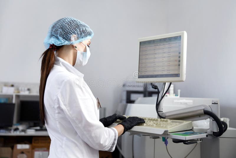 Scientist Working in Laboratory Using Computer Screen Stock Image ... Scientist Working in Laboratory Using Computer Screen Stock Image ...