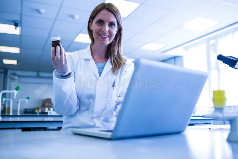 Scientist Working with a Laptop in Laboratory Stock Photo - Image of ...