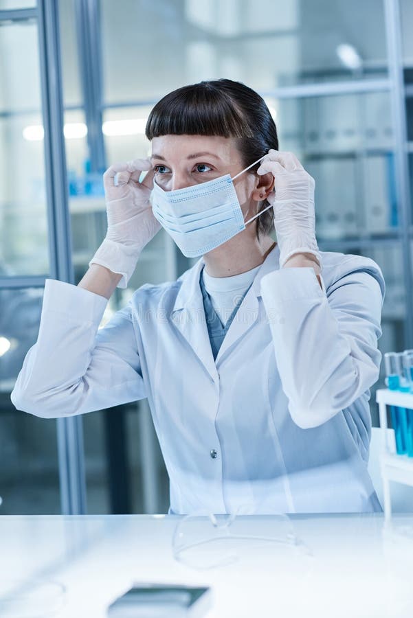 Scientist Working in Protective Wear in Lab Stock Photo - Image of ...
