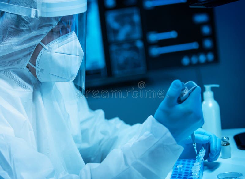 Scientist Works in a Modern Scientific Lab Using Laboratory Equipment ...