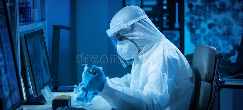 Scientist Works in a Modern Scientific Lab Using Laboratory Equipment ...
