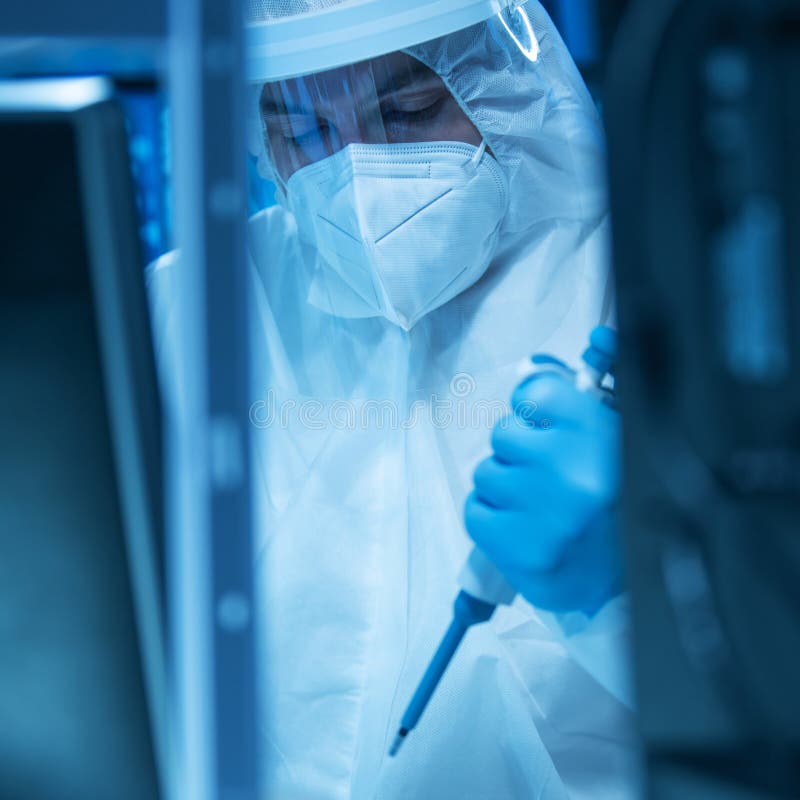 Scientist Works in a Modern Scientific Lab Using Laboratory Equipment ...