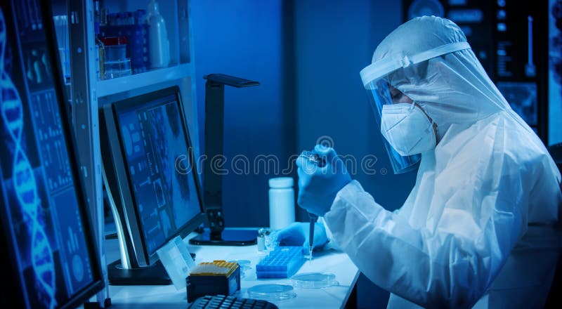 Scientist Works in a Modern Scientific Lab Using Laboratory Equipment ...