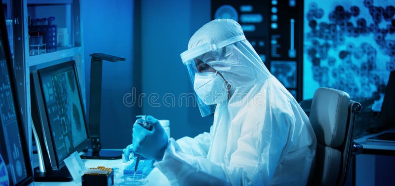Scientist Works in a Modern Scientific Lab Using Laboratory Equipment ...