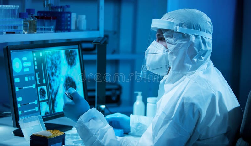 Scientist Works in a Modern Scientific Lab Using Laboratory Equipment ...