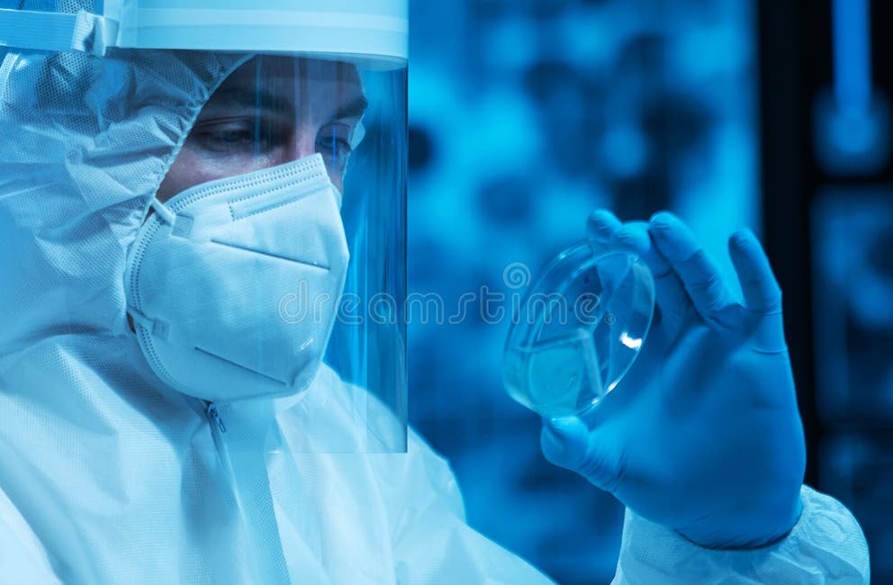 Scientist Works in a Modern Scientific Lab Using Laboratory Equipment ...