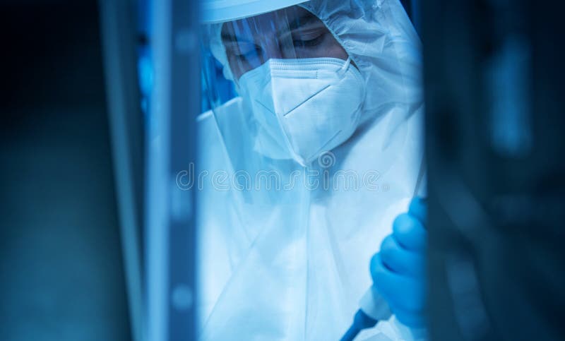 Scientist Works in a Modern Scientific Lab Using Laboratory Equipment ...