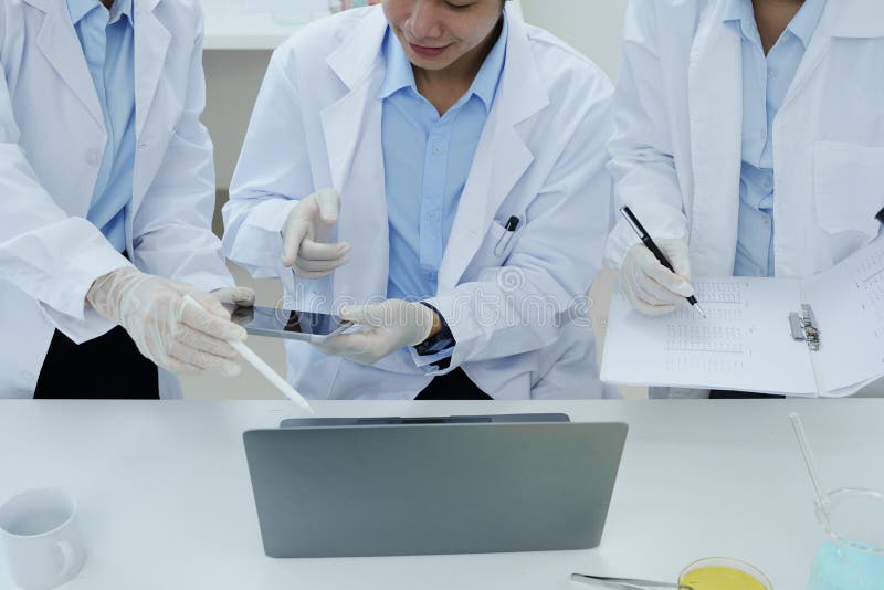 Scientists Analyze Chemical Samples Discuss Technological Innovations ...