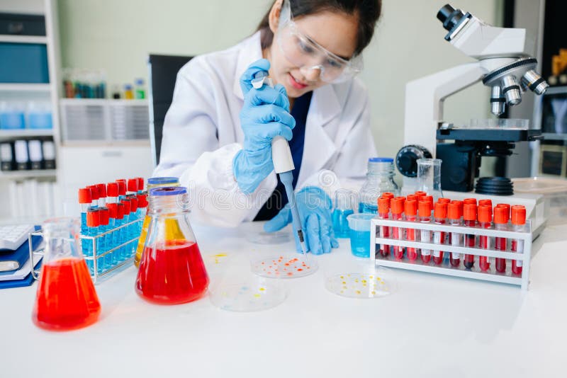 Scientists, Beakers, and Microscopes in Cutting-edge Research. Perfect ...