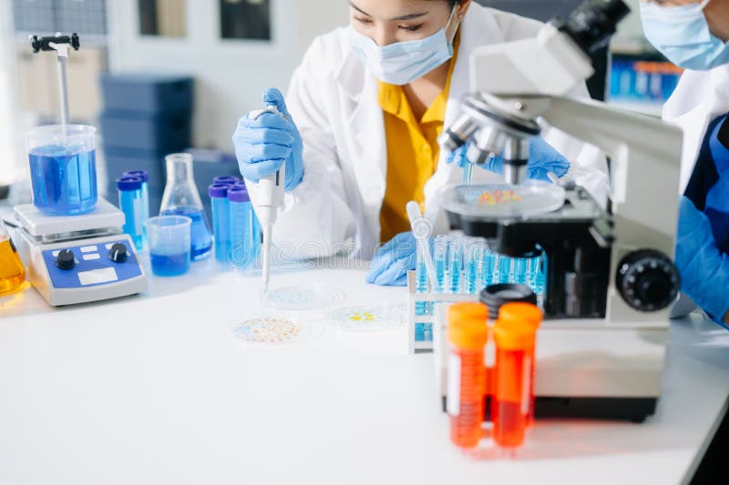 Scientists, Beakers, and Microscopes in Cutting-edge Research. Perfect for Science and ...