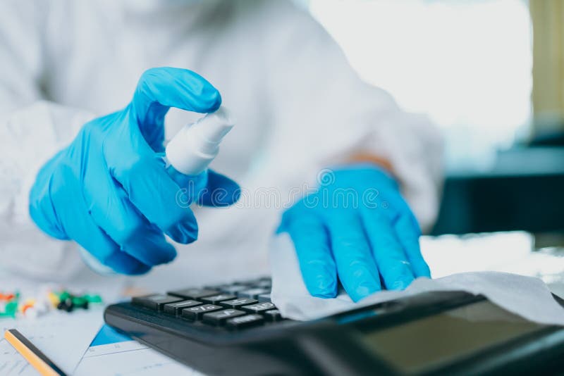 Scientists are Cleaning Calculate by Alcohol and Tissue after Checking ...