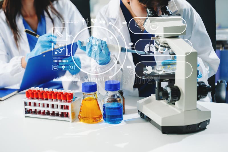 Scientists Conducting Chemistry Research in Laboratory Stock Photo ...