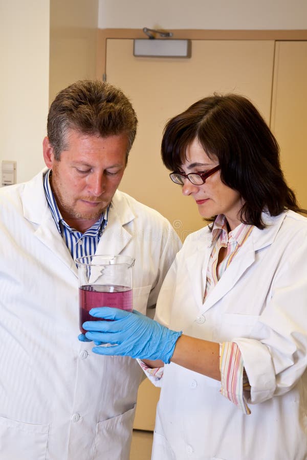 Scientists Discuss Experiment Results Stock Photo - Image of chemistry ...