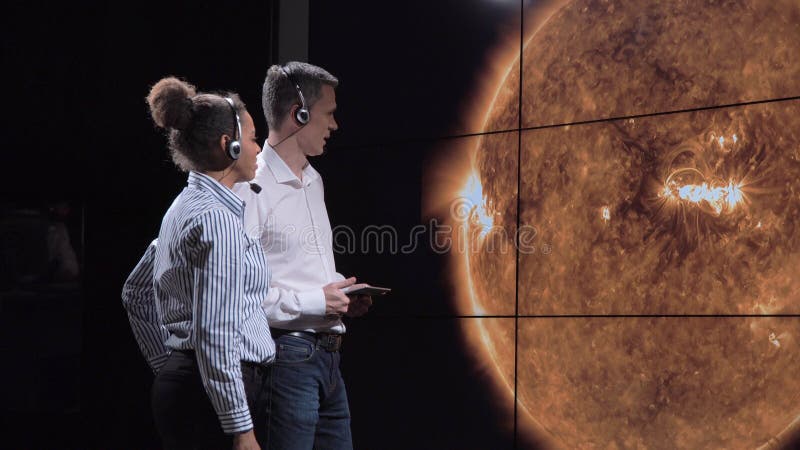 Scientists Discuss Solar Eclipse Shadow on Earth Stock Image - Image of ...