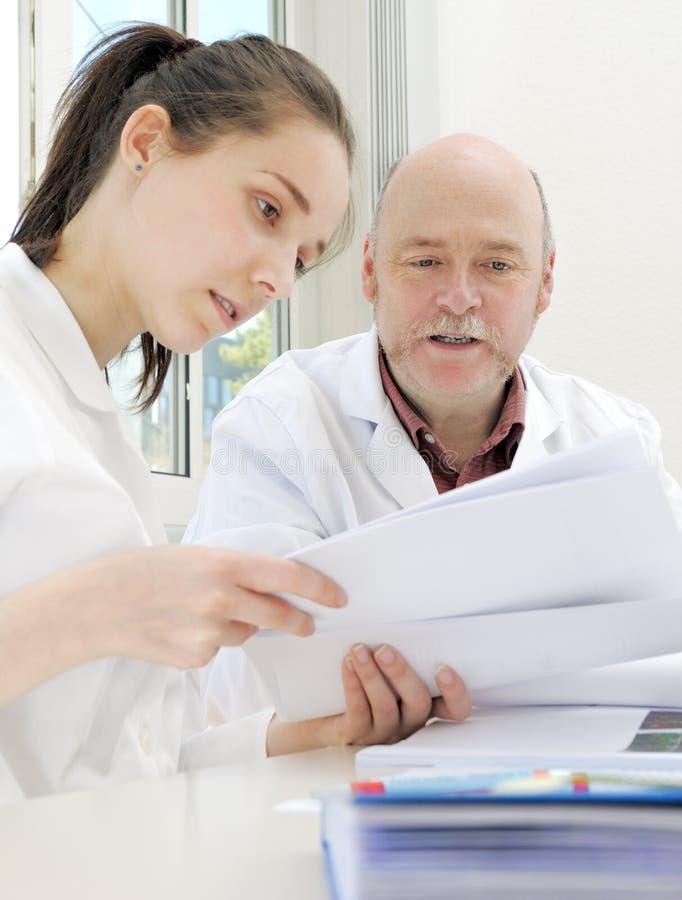 Scientists Discussing Progress of the Project Stock Photo - Image of ...