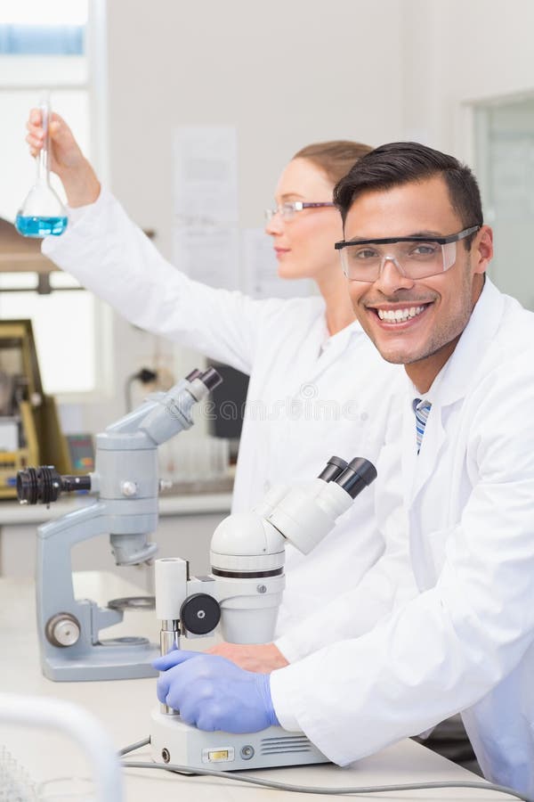 Scientists Examining Blue Precipitate Stock Image - Image of ...