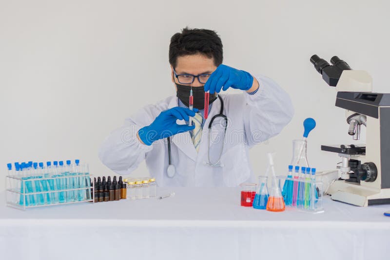 Scientists are Examining Liquid Samples in a Laboratory for Chemical ...