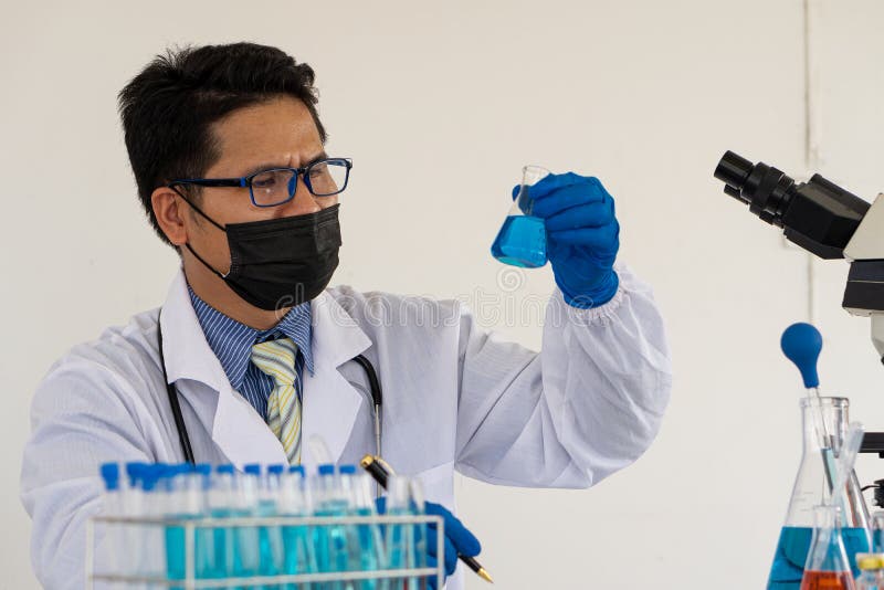 Scientists are Examining Liquid Samples in a Laboratory for Chemical ...