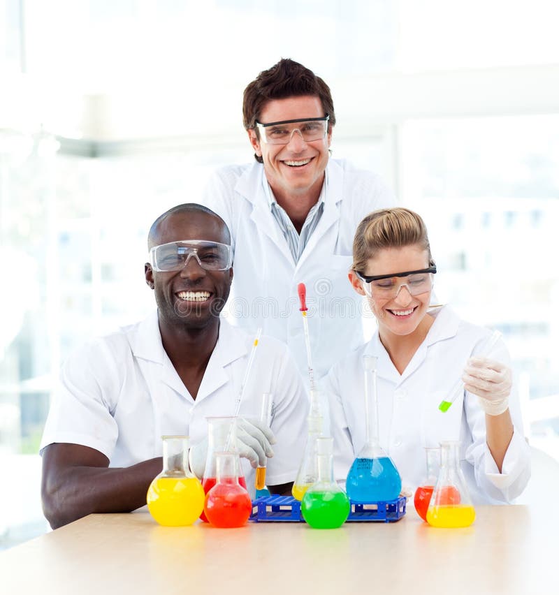 Scientists Examining Test-tubes Smiling Stock Photo - Image of health ...