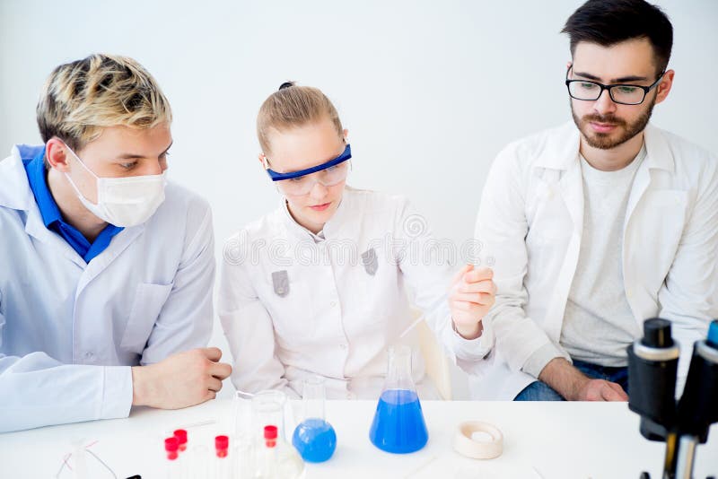 Scientists at laboratory stock image. Image of research - 92883307