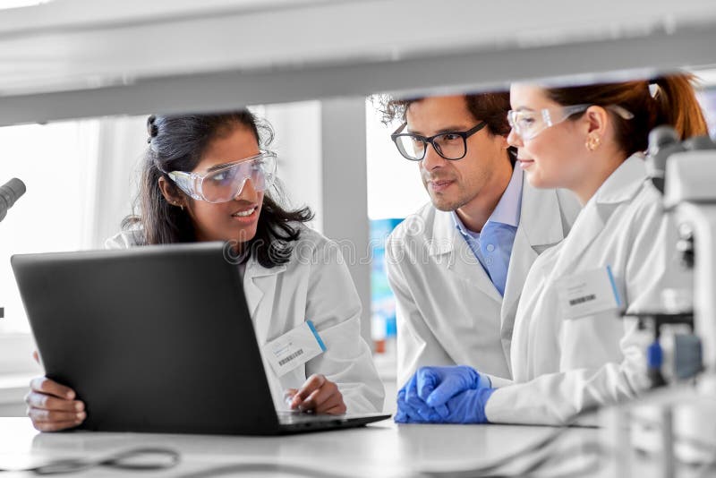 Scientists with Laptop Working in Laboratory Stock Image - Image of ...