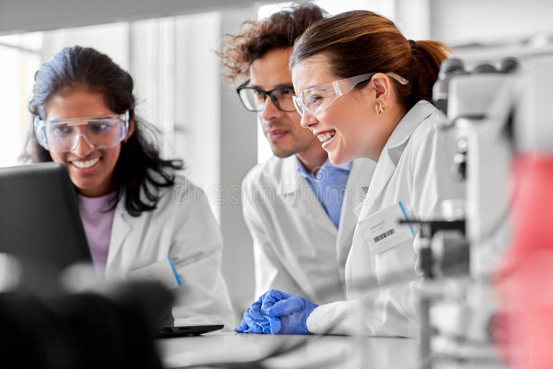 Scientists with Laptop Working in Laboratory Stock Image - Image of ...