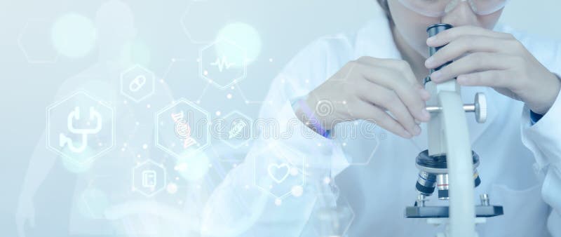 Scientists Looking at Samples Under a Microscope this Image is a ...