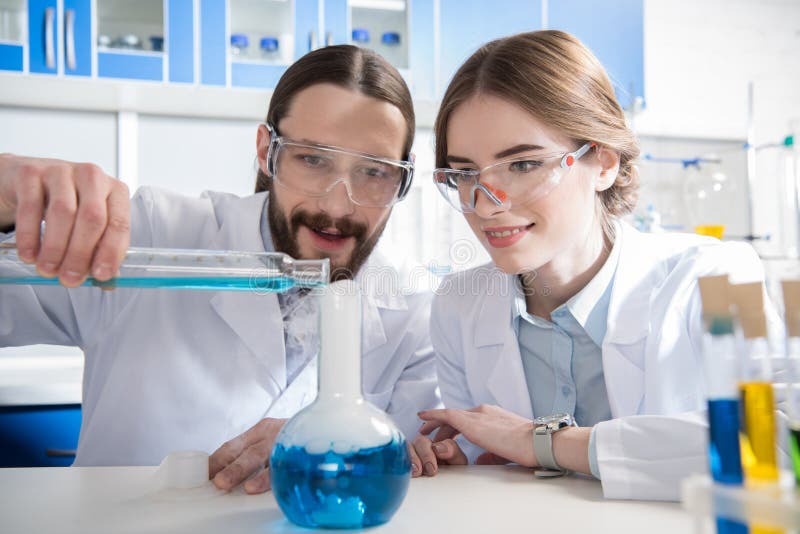 Scientists Making Experiment Stock Photo - Image of female ...