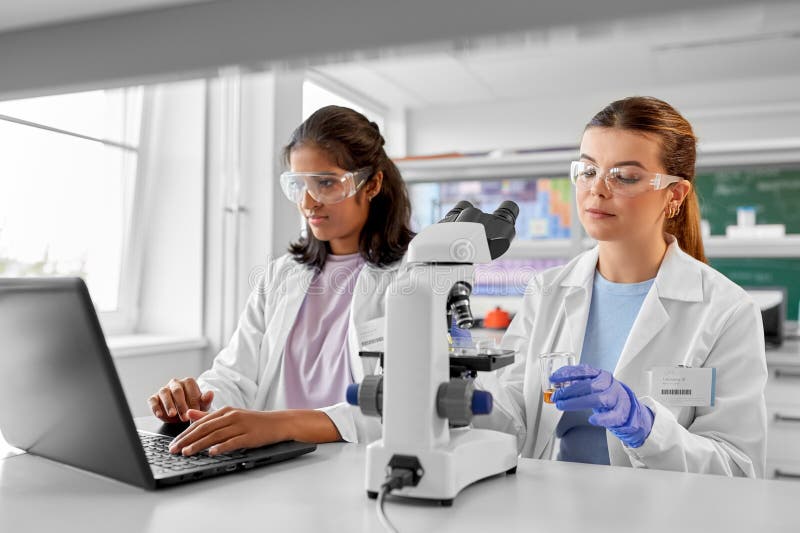 Scientists with Microscopes Working in Laboratory Stock Photo - Image ...