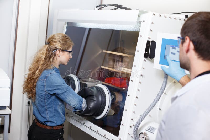 Scientists Research in a Lab Environment Stock Image - Image of people ...