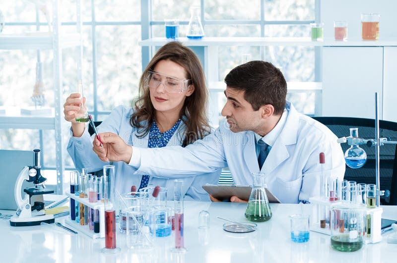 Scientists are Researching and Recording in Science Laboratories Stock ...