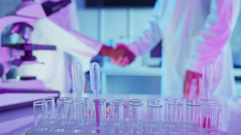 Scientists Shaking Hands in Laboratory Stock Video - Video of ...