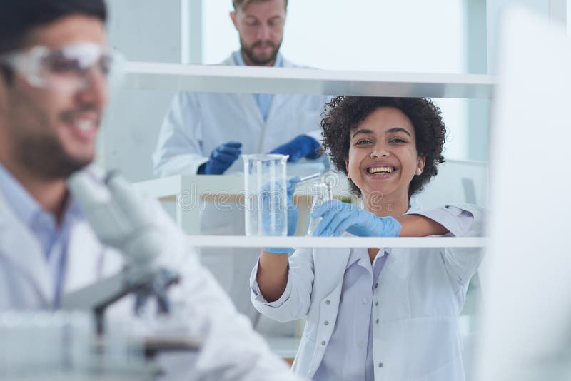 Smiling Scientists Looking at Camera Arms Crossed in Laboratory Stock ...