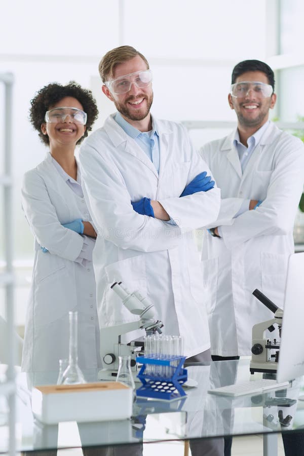 Smiling Scientists Looking at Camera Arms Crossed in Laboratory Stock ...