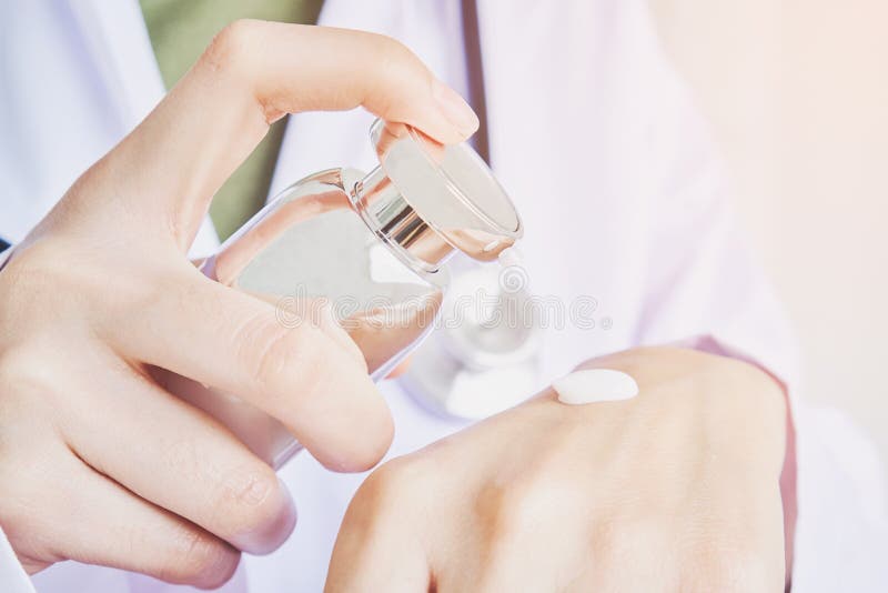 Scientists Study the Natural Extracts. and Use Hand Cream. the Concept ...