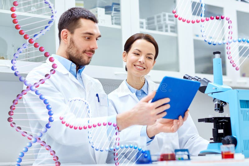 Scientists with Tablet Pc and Microscope in Lab Stock Photo - Image of ...