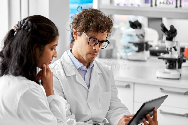 Scientists with Tablet Pc Working in Laboratory Stock Image - Image of ...