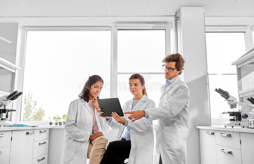 Scientists with Tablet Pc Working in Laboratory Stock Photo - Image of ...
