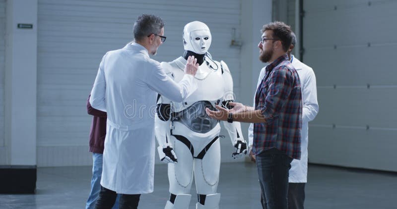 Scientists Testing a Humanoid Robots Hand Movement Stock Image - Image ...