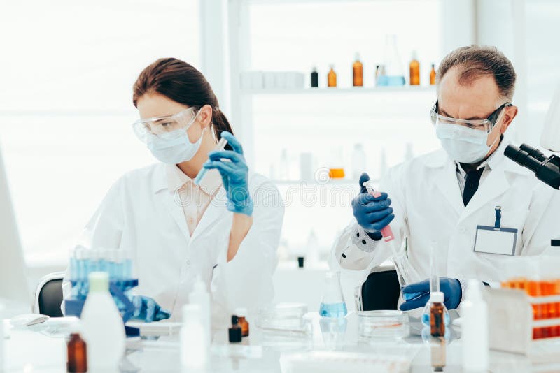 Scientists are Testing in a Medical Laboratory. Science Stock Image ...